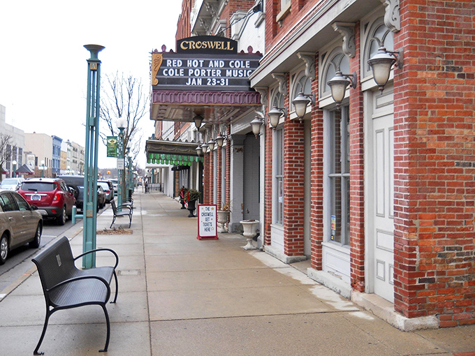 The Croswell's exterior maintains its historic charm while the marquee announces contemporary performances, bridging past and present seamlessly.