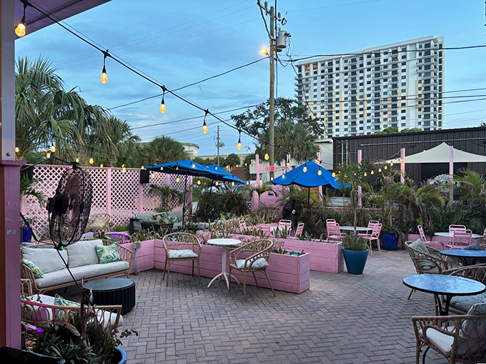 Pink-hued paradise awaits on this Instagram-ready patio where string lights create a magical canopy for sipping craft cocktails under the Miami sky.