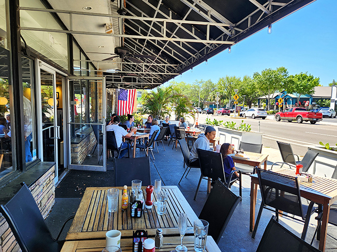 The outdoor patio offers al fresco dining where Florida sunshine pairs perfectly with coffee refills and people-watching between bites.