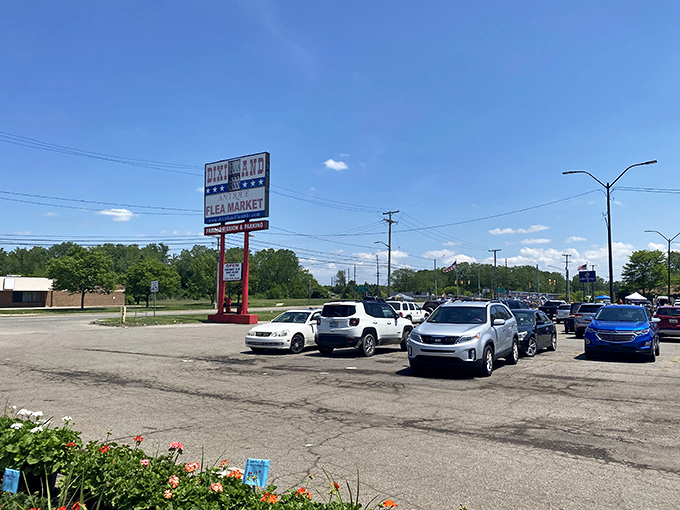 A full parking lot tells the story of Dixieland's enduring popularity, where Michigan residents still choose real-world browsing over online scrolling.