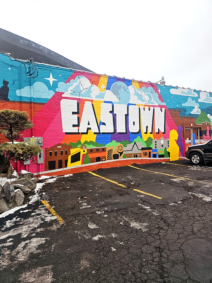 Even the parking area sports Eastown pride with a vibrant mural that captures the neighborhood's artistic spirit &ndash; the perfect prelude to your Caribbean adventure.