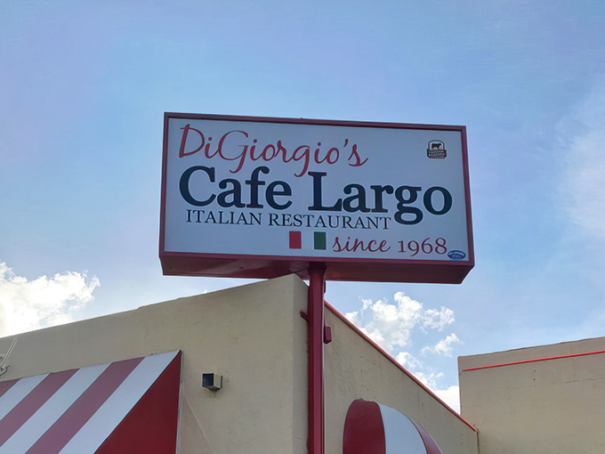 The restaurant's sign stands proud against the Florida sky, marking this Italian oasis in the heart of the Keys.