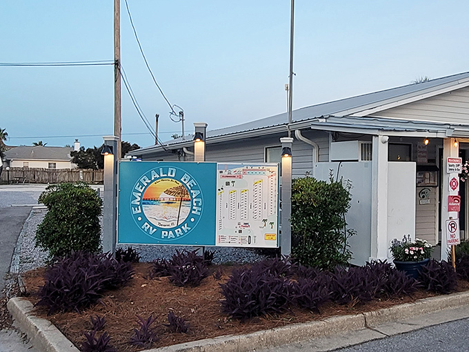 The welcoming sign promises coastal magic beyond &ndash; your first hint that this isn't just another RV park, but a destination worth remembering.