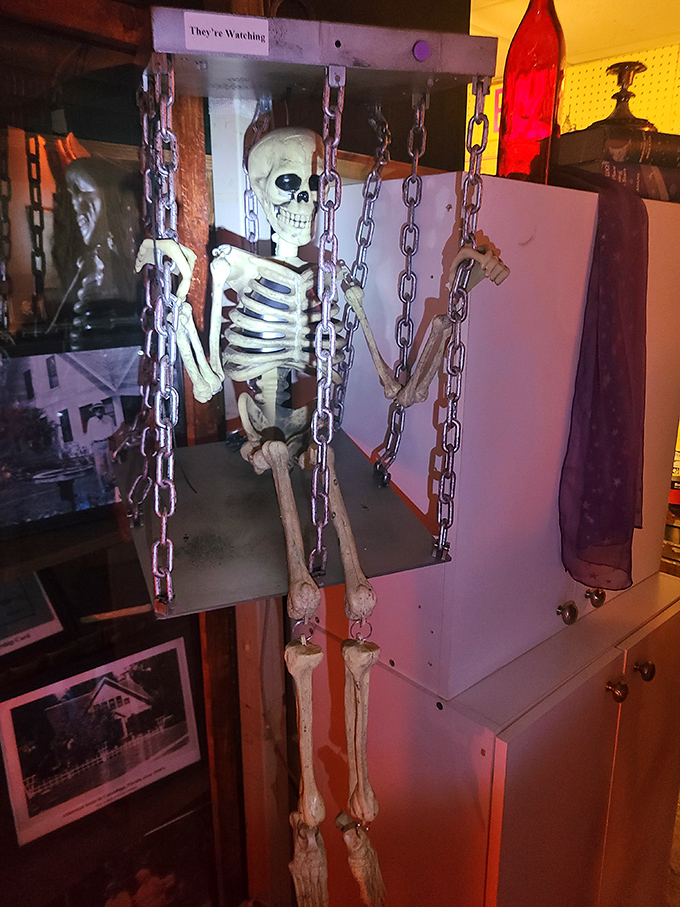 A skeletal prisoner swings gently in his chains, demonstrating the museum's perfect balance between the macabre and the playfully spooky.