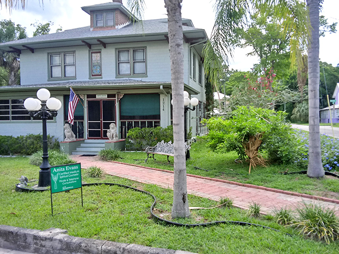 This charming spiritual counselor's residence doubles as an office, where the porch furniture invites you to sit a spell before, well, discussing spells.