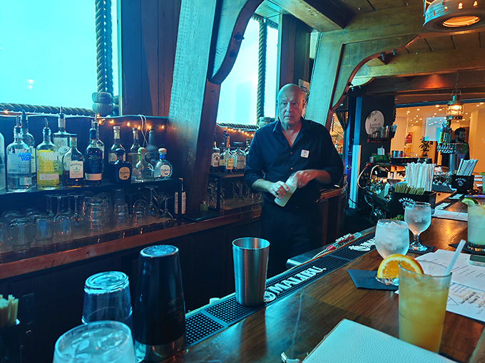 Staff: Behind every great underwater experience is a bartender crafting liquid magic, ensuring your glass never stays empty during your aquatic adventure.