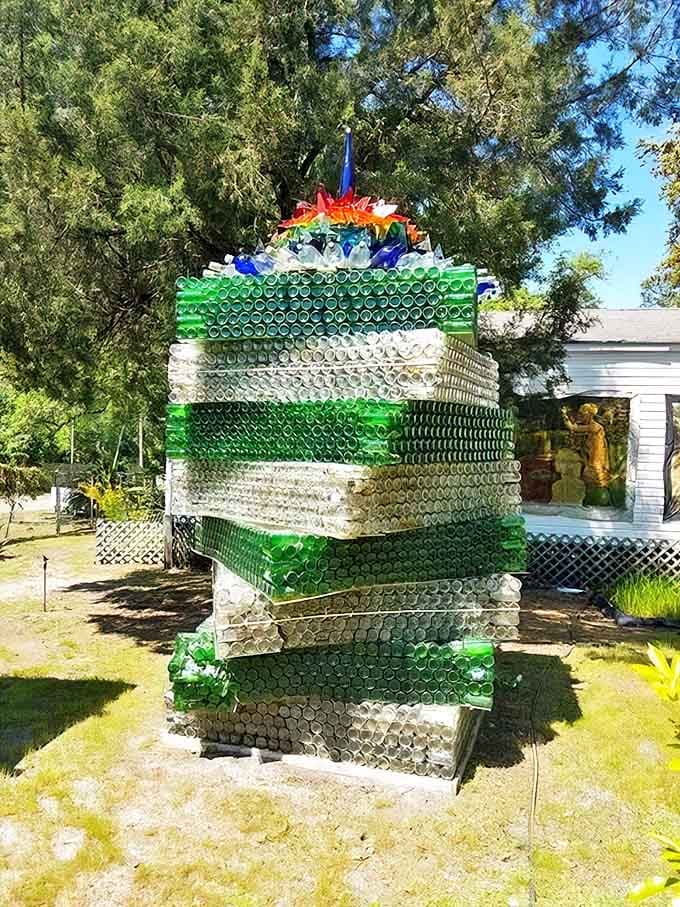 Stacked bottles create a tower of green and white stripes, proving that one person's recycling is another's architectural statement.