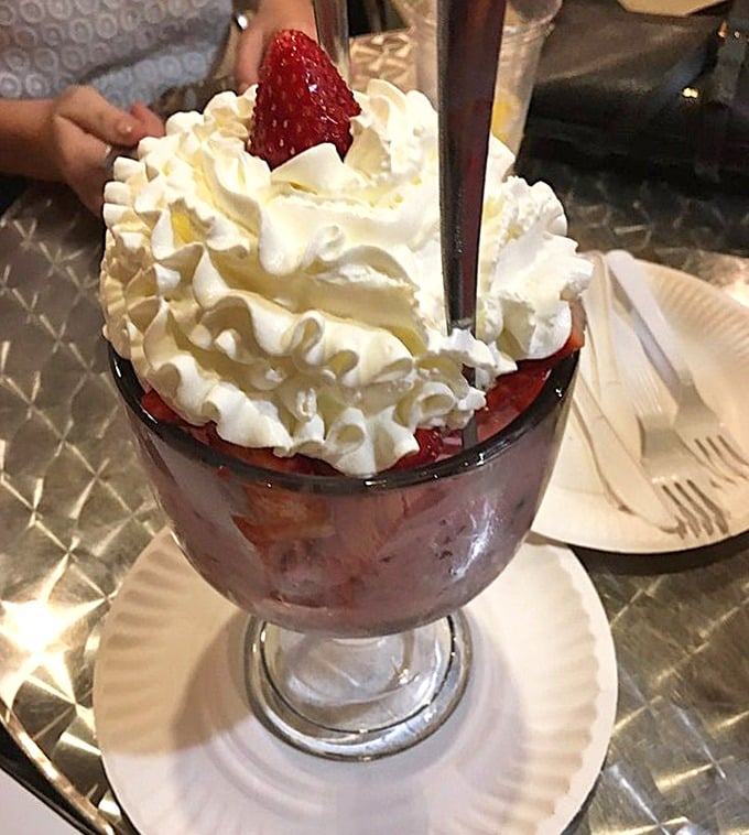 The ultimate reward after a day of picking&mdash;a mountain of fresh strawberries crowned with clouds of whipped cream.