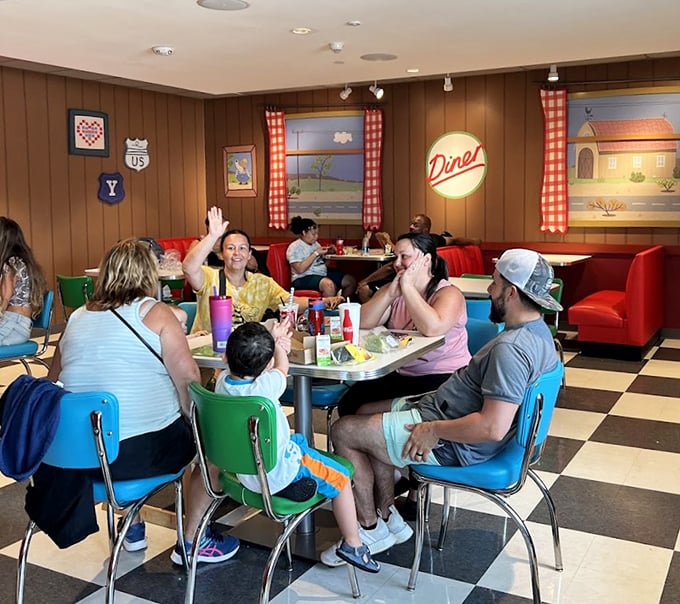 The Theme Park Dining Area recreates a classic American diner with Peppa flair – where hungry adventurers refuel with kid-friendly fare in retro-cool surroundings.