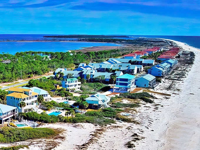 Bird's eye view of the boardwalk cutting through coastal wilderness &ndash; like a wooden signature on nature's canvas.