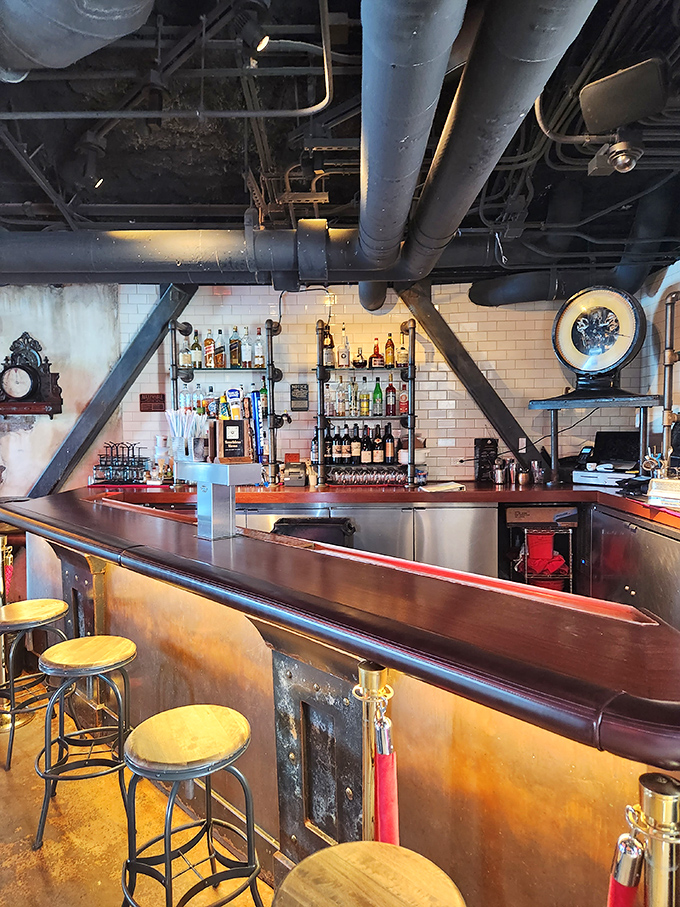 The Edison's bar counter offers front-row seats to mixology magic, where vintage subway tiles meet exposed pipes and spirits line up like soldiers awaiting deployment.