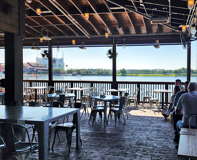 Waterfront tables offer front-row seats to Disney Springs' shimmering lagoon, where sunset transforms a meal into a memory worth keeping.