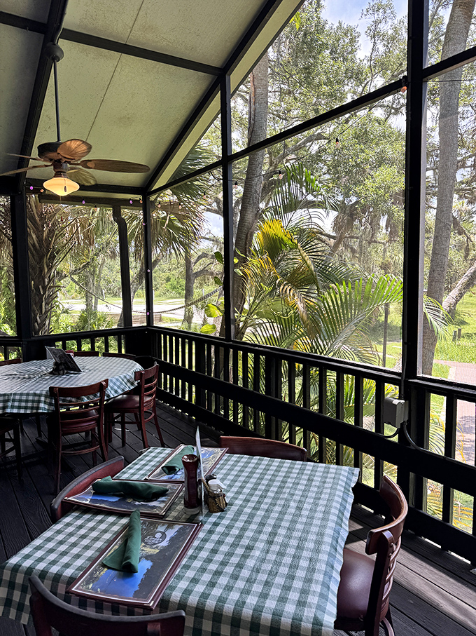 The screened porch provides the ultimate Florida dining experience &ndash; gentle breezes, lush views, and protection from the state's infamous mosquitoes.