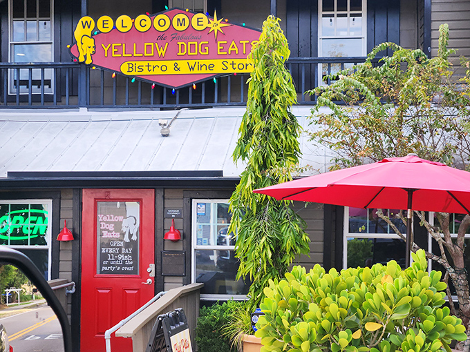 The exterior view showcases Yellow Dog Eats in all its quirky glory &ndash; a destination that stands out from Florida's dining landscape like a beacon of barbecue brilliance.
