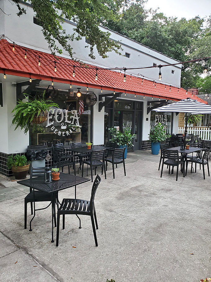 Evening transforms the patio into a twinkling retreat – string lights overhead and satisfied diners below, savoring the last bites of sandwich perfection.