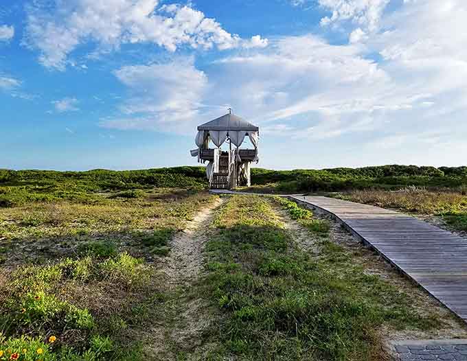 A beachside pavilion stands ready for sunset admirers, offering the perfect perch for witnessing nature's daily color show over the Gulf.