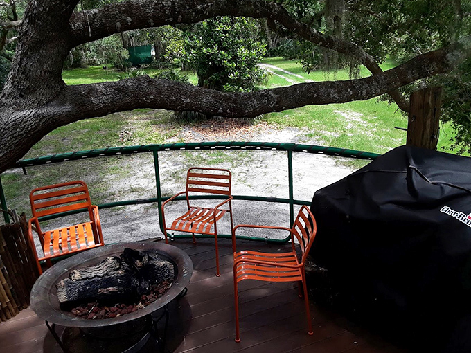 Simple pleasures reign supreme on the deck, where orange chairs circle a fire pit ready for evening s'mores and stargazing conversations.