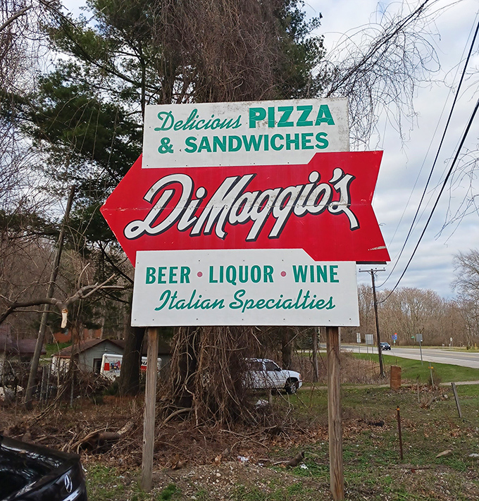 Signage: The retro arrow sign points not just to a restaurant but to a destination where time-honored recipes and genuine hospitality never go out of style.