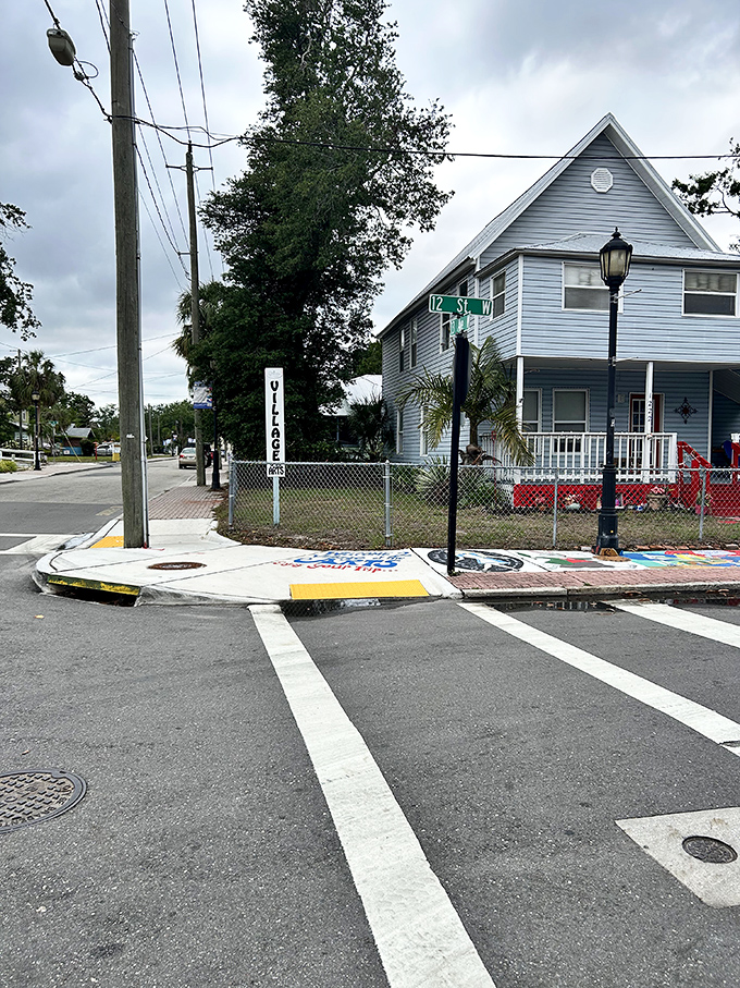 Street corners become canvases in the Village &ndash; where even the mundane meeting of roads deserves a splash of color.