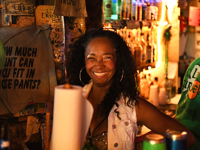 Behind the bar, where the magic happens &ndash; simple drinks served with genuine smiles in an atmosphere that corporate chains spend millions trying to replicate.