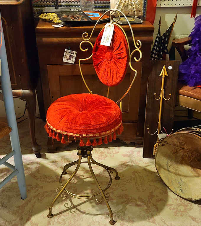 That red vanity chair isn't just seating&mdash;it's a 1960s glamour station waiting for someone to apply cat-eye liner while listening to The Supremes.