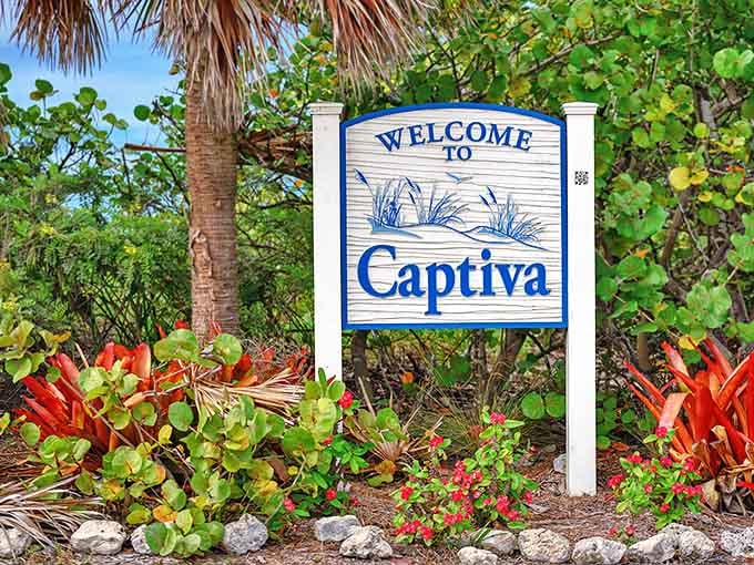 The preserve's entrance sign, framed by lush palms, promises an authentic wildlife experience that stands apart from Florida's manufactured attractions.