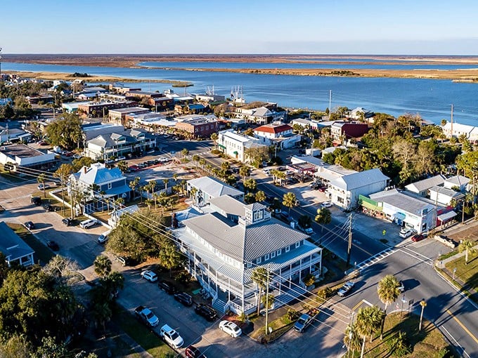 Apalachicola's working waterfront connects visitors to Florida's maritime heritage, with boats bringing in the day's catch.
