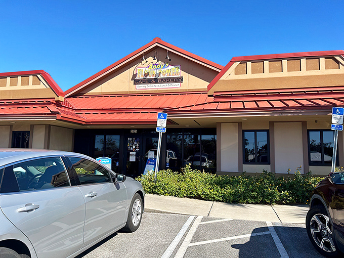 Andy's Flour Power's welcoming exterior promises breakfast bliss with its cheerful red roof and casual vibe.