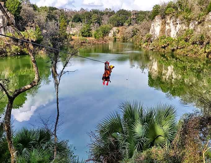 Soaring over crystal-clear water surrounded by limestone cliffs feels like discovering Florida's secret canyon country.