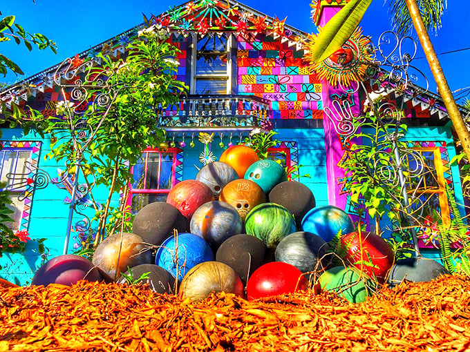 Whimzeyland explodes with color like a rainbow that couldn't make up its mind. Bowling balls create a playful sculpture garden.