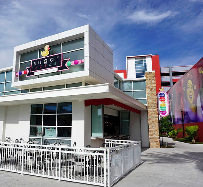 Sugar Factory's sleek building stands ready to welcome sweet-toothed visitors into its colorful, sugar-filled world.
