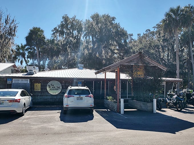 Surrounded by moss-draped oaks and bathed in Florida sunshine, this historic restaurant looks like it belongs in the pages of the famous novel it's named after.
