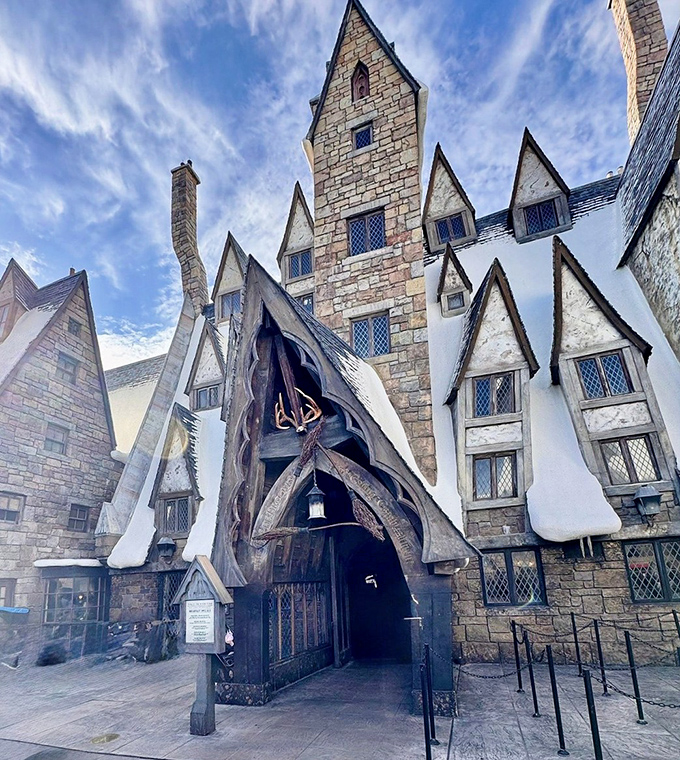 Stone archways and weathered wooden beams create the perfect medieval tavern atmosphere. You half-expect a wizard to walk through those massive doors at any moment!