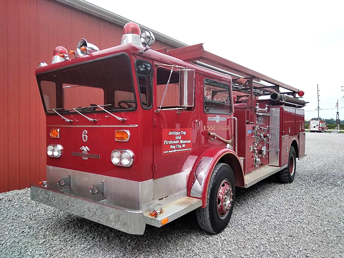 This meticulously restored American LaFrance engine gleams with history, its chrome fittings telling stories of fires fought and lives saved.