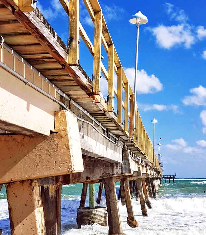 Anglin's Fishing Pier stretches into the Atlantic like a wooden runway, where fish stories grow bigger with every step toward the horizon.