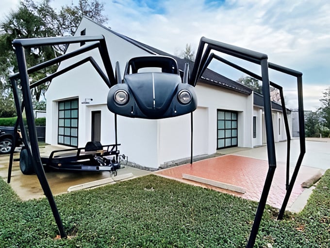 Eight metal legs support this classic Beetle, transforming German engineering into arachnid artistry that stops traffic and starts conversations.