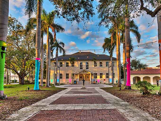 Historic architecture meets contemporary creativity at this cultural gem, where colorful palm trunks add whimsy to artistic exploration.