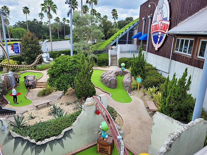 The Drive-In Golf course winds through elaborate movie-inspired landscapes, offering challenges for putters of all skill levels.
