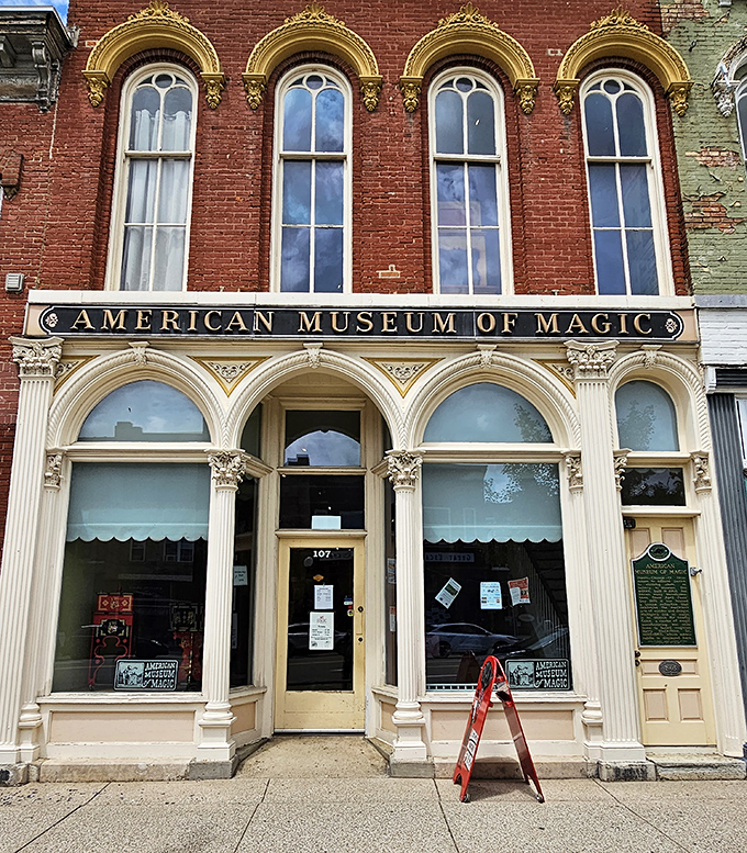 Ornate architectural details frame the museum entrance, where vintage lettering announces America's largest collection of magical artifacts and memorabilia.
