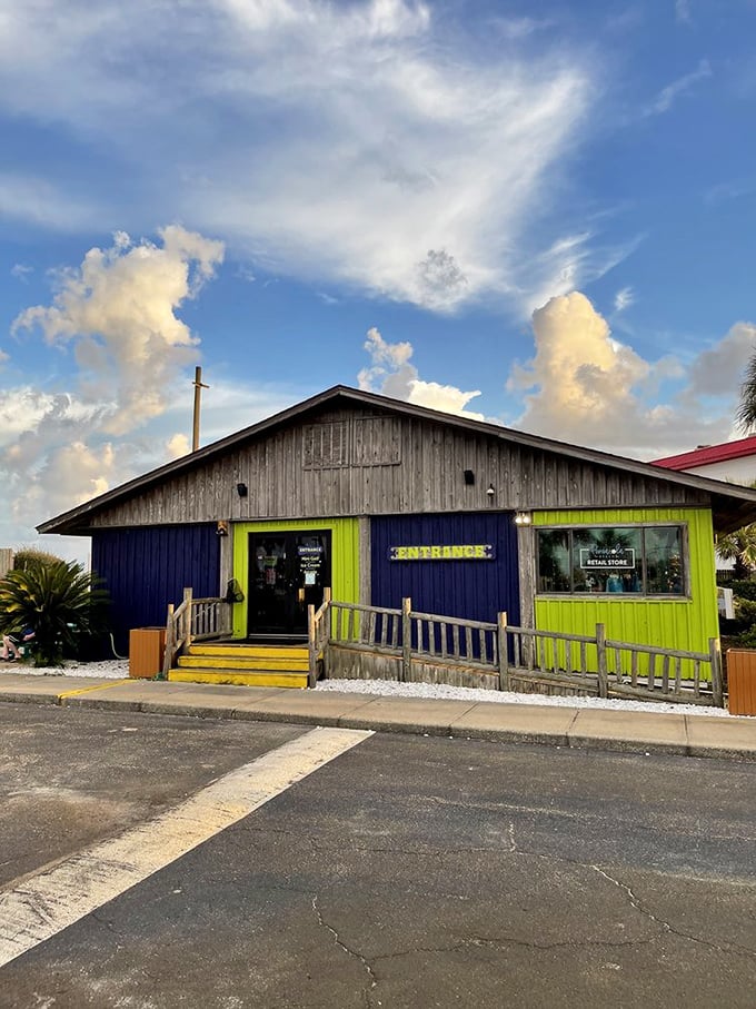 Entrance: The vibrant blue and lime green building stands out like a cosmic beacon. With its quirky charm, it's practically begging earthlings to investigate.