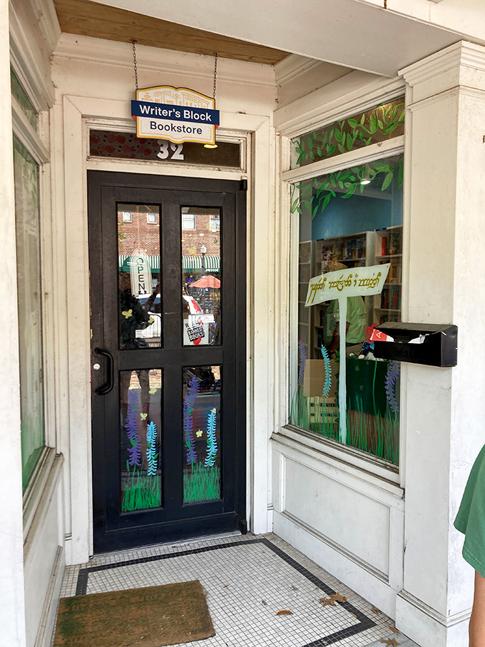 Step through this whimsical doorway adorned with painted flowers and you'll cross the threshold from everyday life into a world of literary wonders.