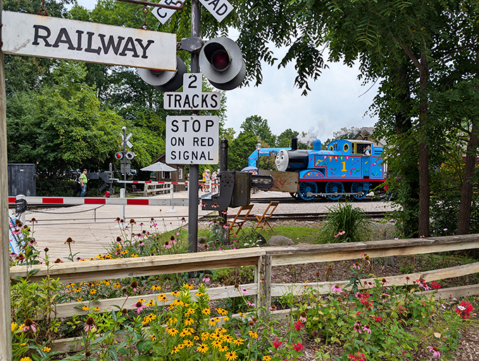 The railway crossing sign stands sentinel, a nostalgic reminder of simpler times when train whistles punctuated the rhythm of daily life.