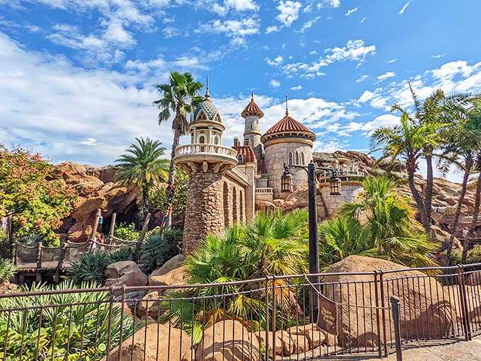 Prince Eric's castle provides a storybook backdrop to the grotto experience. Those turrets aren't compensating for anything&mdash;they're just royally impressive!