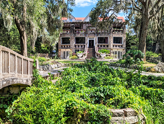Those curved bridges and terraced levels create a theatrical entrance worthy of a dramatic movie reveal – just add fog machine and suspenseful music.
