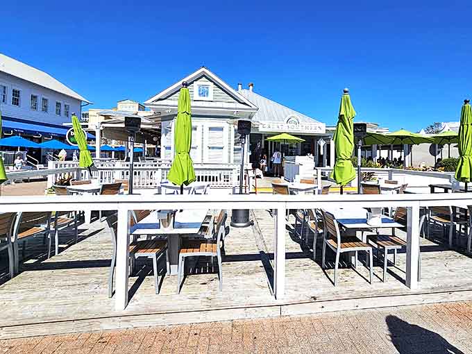 The Great Southern Cafe's outdoor seating beckons with bright lime umbrellas, promising seafood feasts and people-watching opportunities in equal measure.