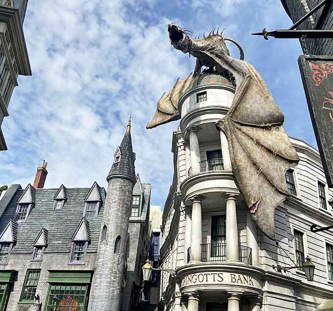 The Ukrainian Ironbelly dragon perched atop Gringotts occasionally roars and breathes actual fire, causing everyone below to stop mid-butterbeer sip.