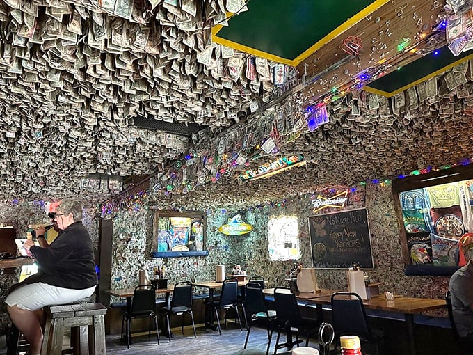 Interior: Step inside and witness the ultimate wallpaper upgrade &ndash; who needs paint when you've got presidents by the thousands watching over your meal?