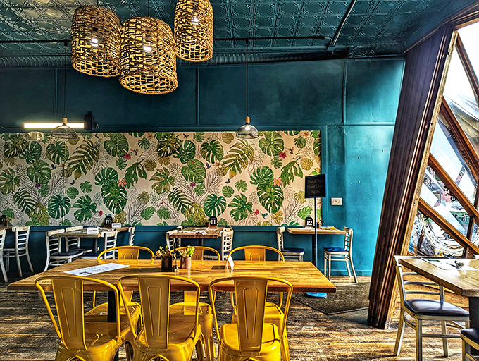 Step inside and the vacation continues &ndash; turquoise walls, woven basket lights, and tropical wallpaper transport you straight to island time.