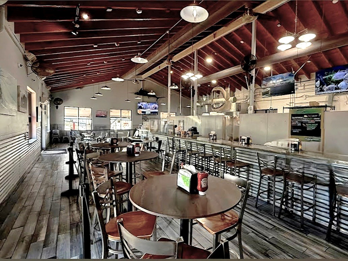 Wooden beams and casual seating create the perfect backdrop for seafood feasts, where the focus stays firmly on what's on your plate.