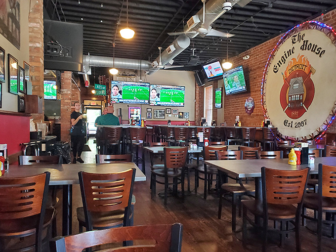 Inside, exposed brick walls and wooden tables create that perfect neighborhood vibe where sports fans gather for good food and company.